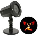 Orange Angry Face LED Projector Party City
